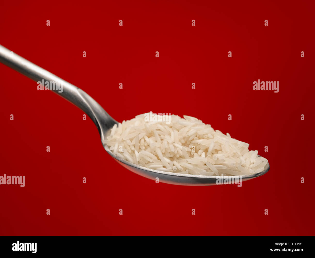 Basmati Rice on spoon Stock Photo - Alamy