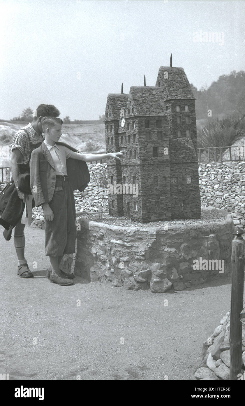 1930s, two Czech boys study a scale model of a building, Czechoslovakia ...