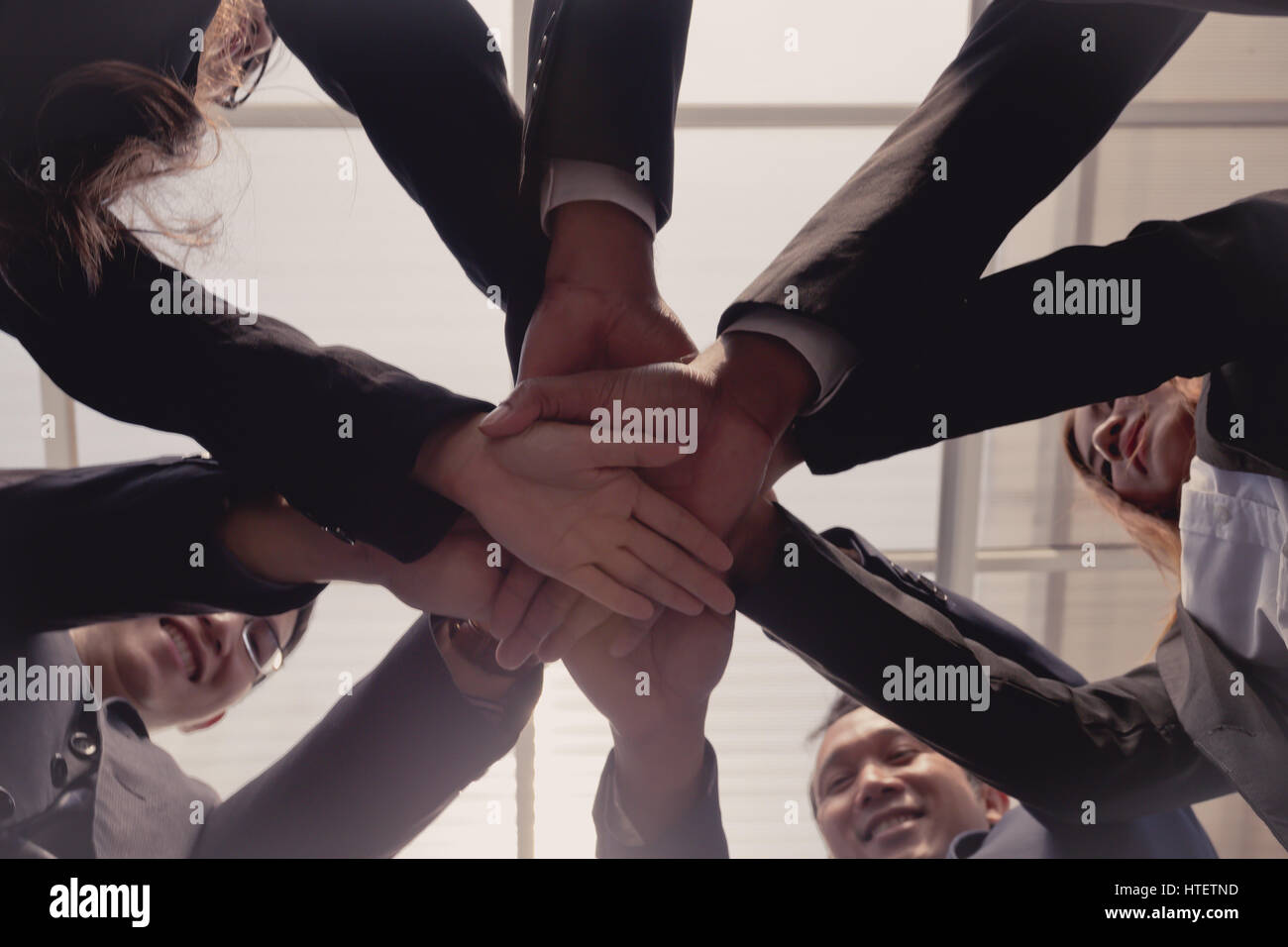 Business people join hand together during their meeting, Teamwork ...