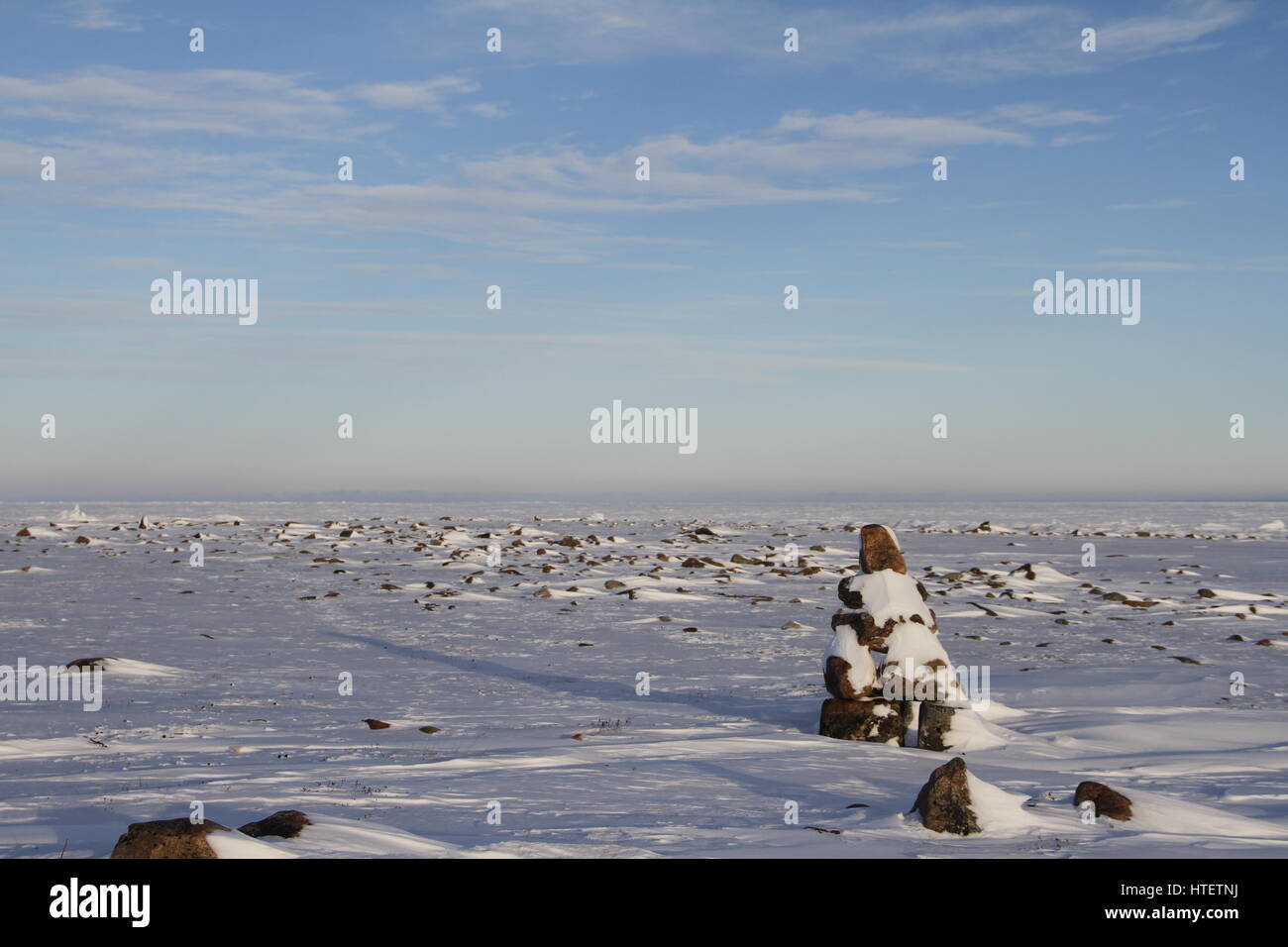 Inuksuk or Inukshuk along the coastline north of Arviat, Nunavut Stock ...