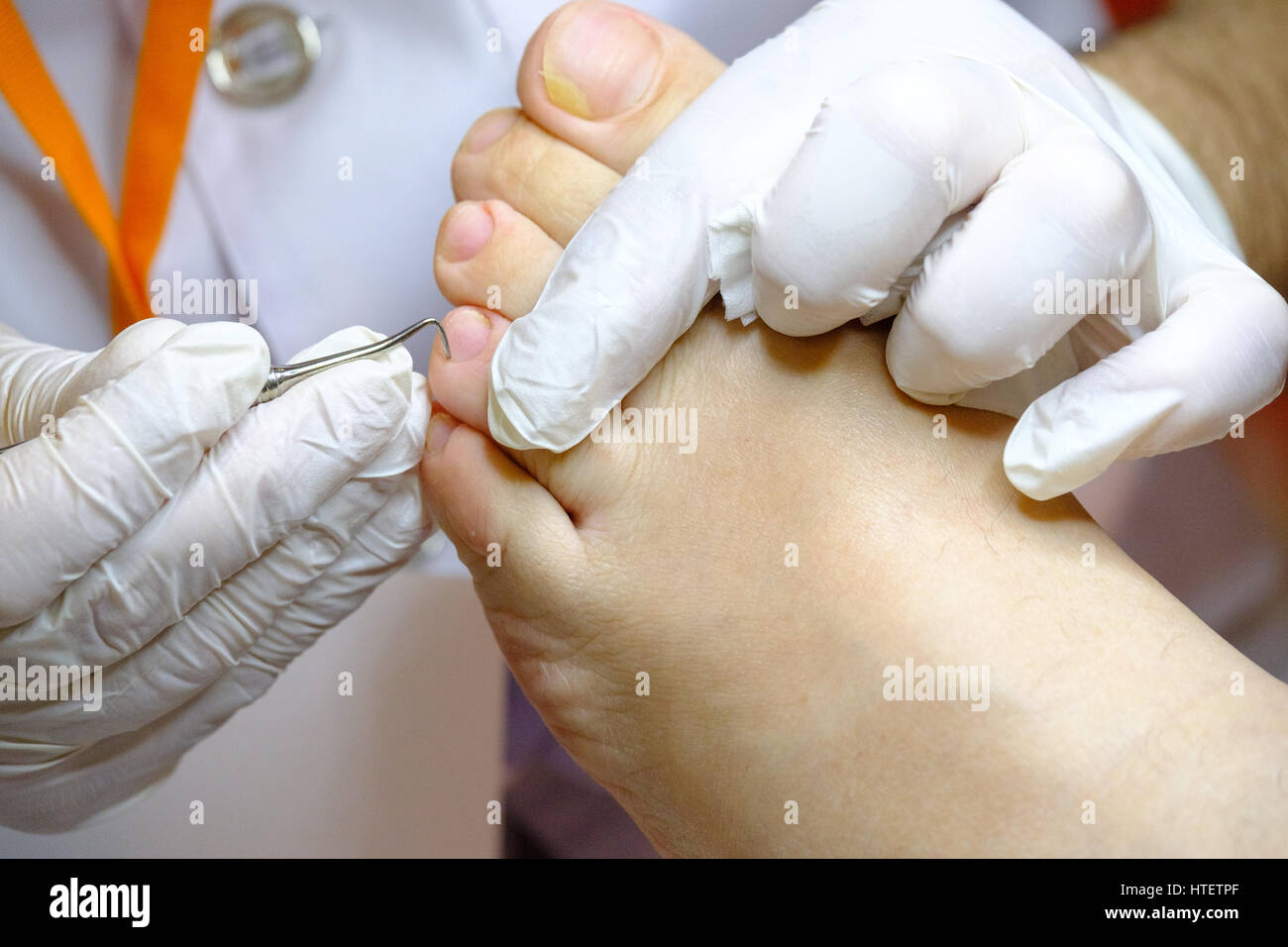 Pedicure specialist works with the patient in clinic Stock Photo - Alamy