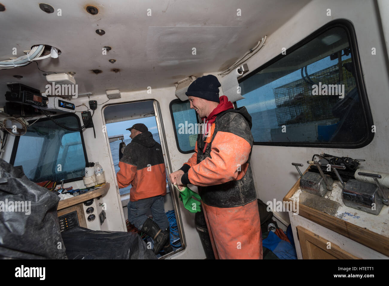 Lobstermen prepare to haul / check lobster traps. Portland, Maine Stock ...