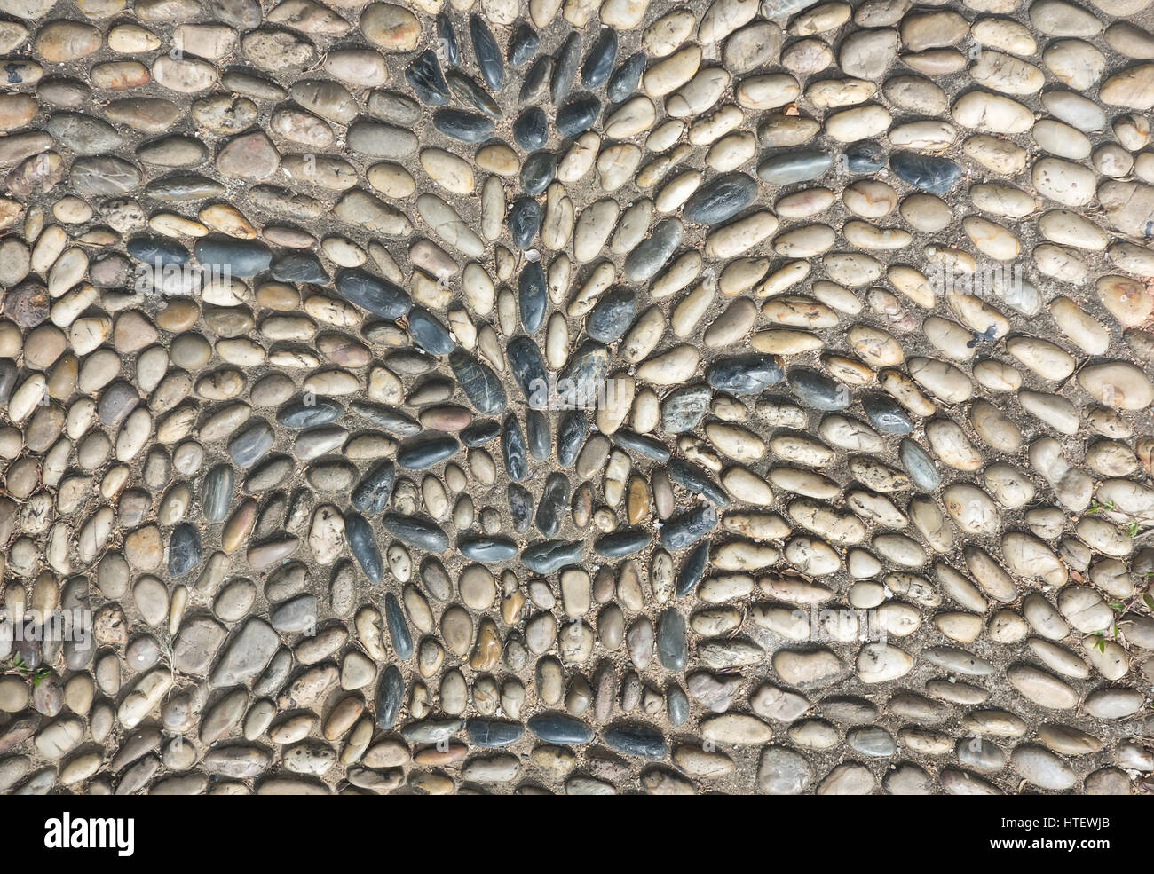 background made of a closeup of a wall with pebbles Stock Photo - Alamy