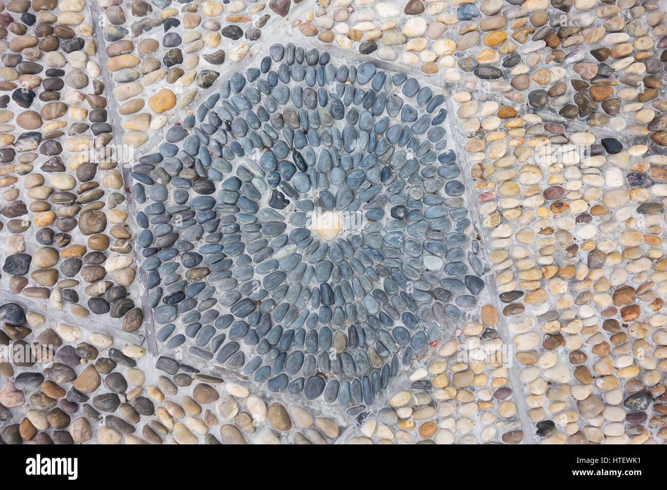 background made of a closeup of a wall with pebbles Stock Photo - Alamy
