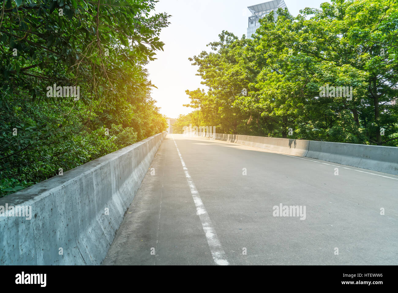 Empty road with slight Stock Photo - Alamy