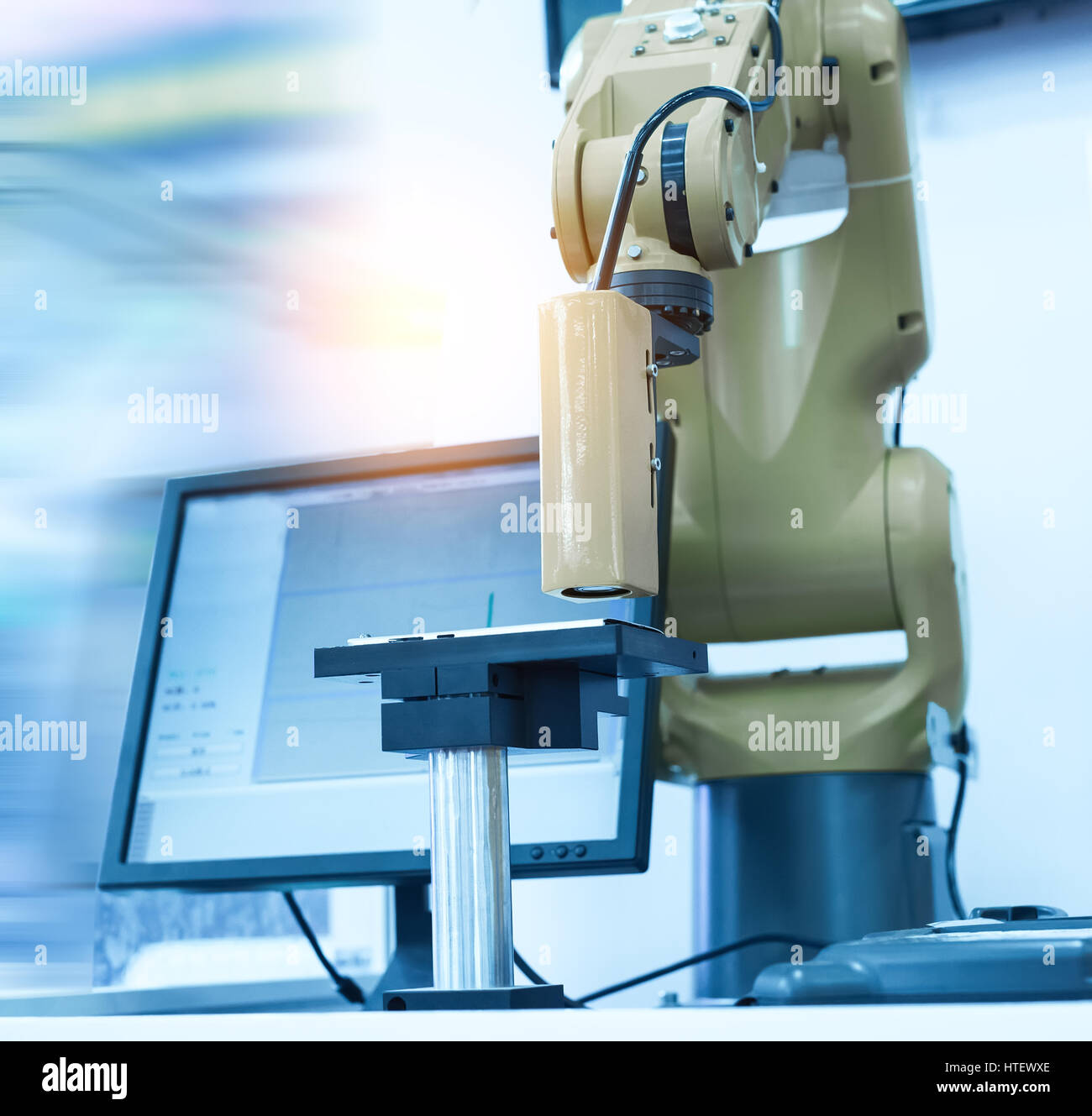 Automatic robot in assembly line working in factory. Smart factory ...