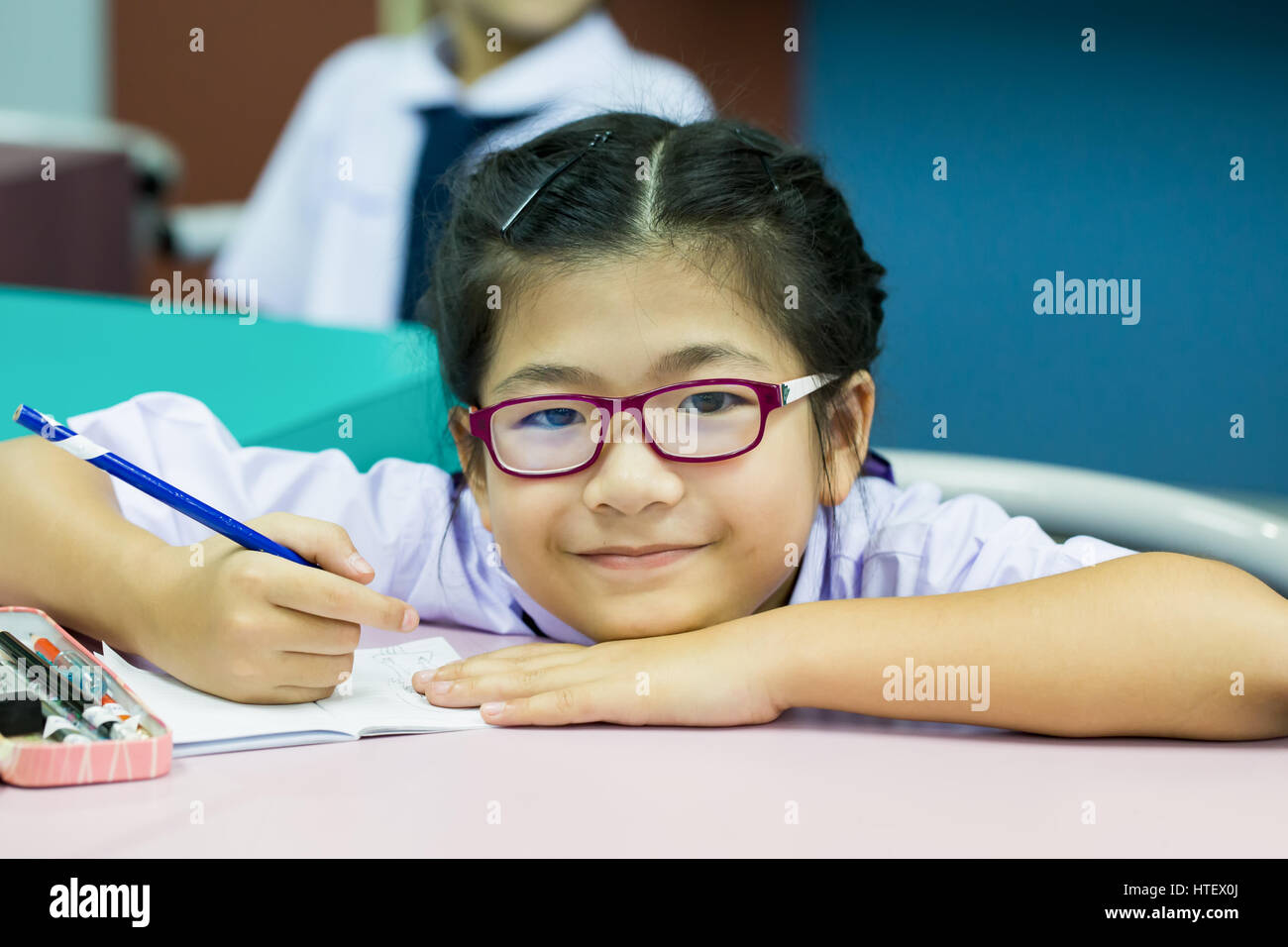 Portrait of Asian girl in elementary school class Stock Photo - Alamy