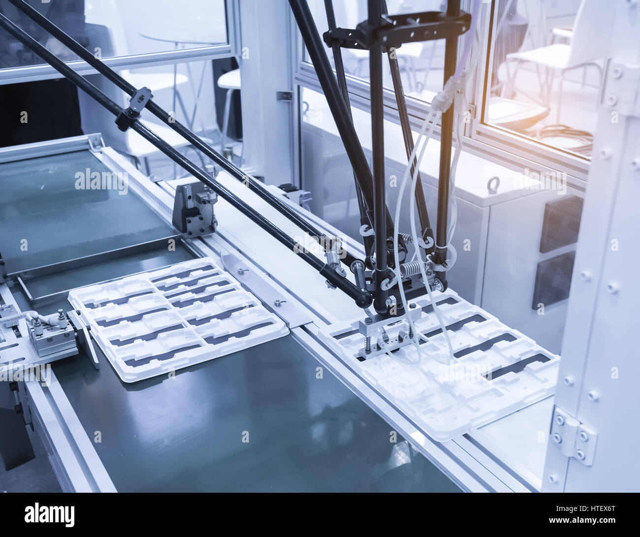 Automatic robot in assembly line working in factory. Smart factory ...