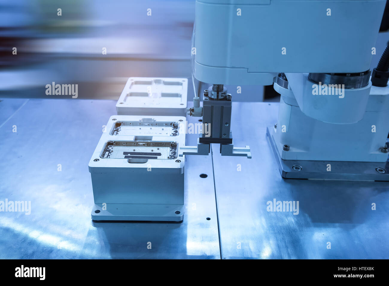 Automatic robot in assembly line working in factory. Smart factory ...