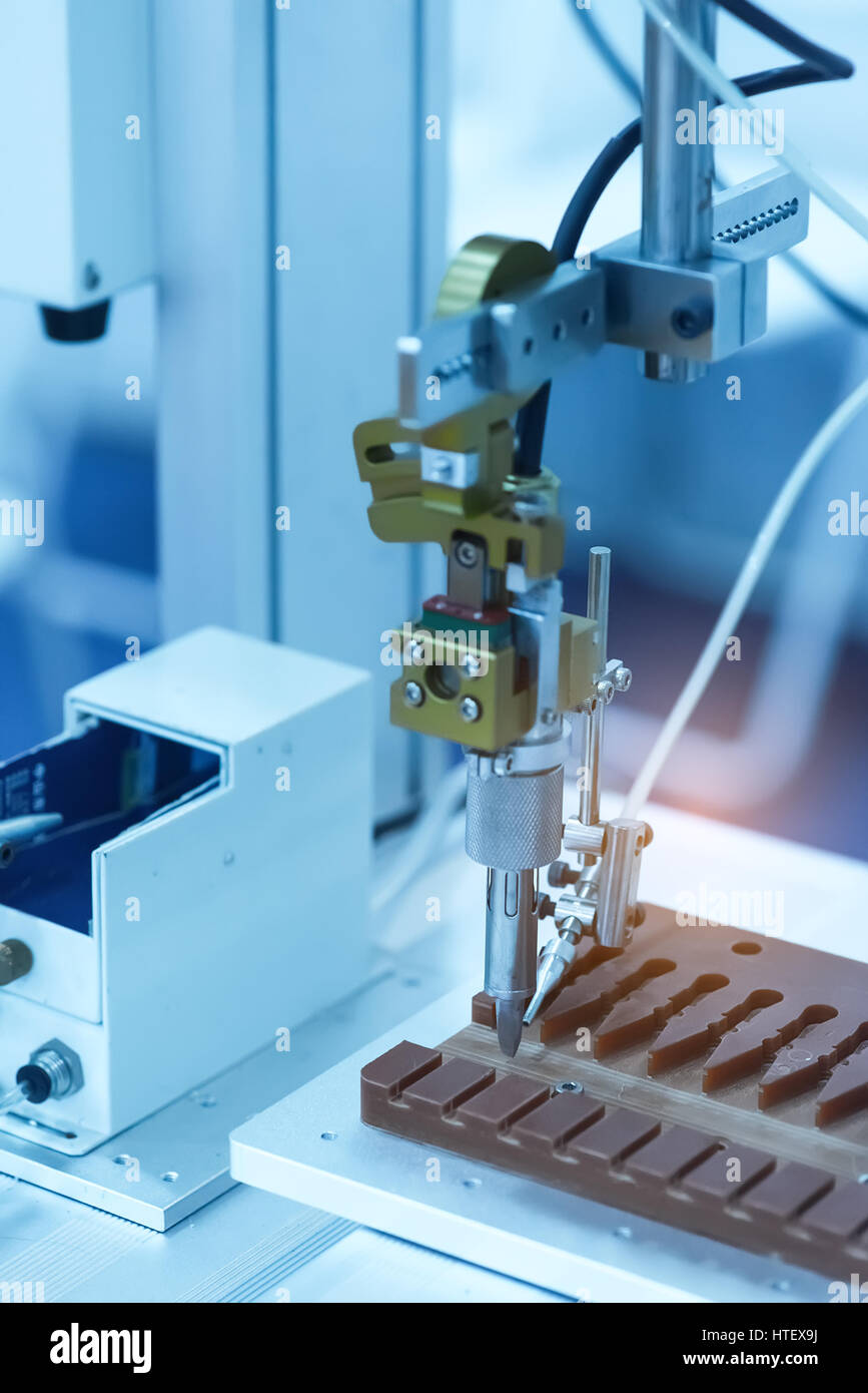 Automatic robot in assembly line working in factory. Smart factory ...