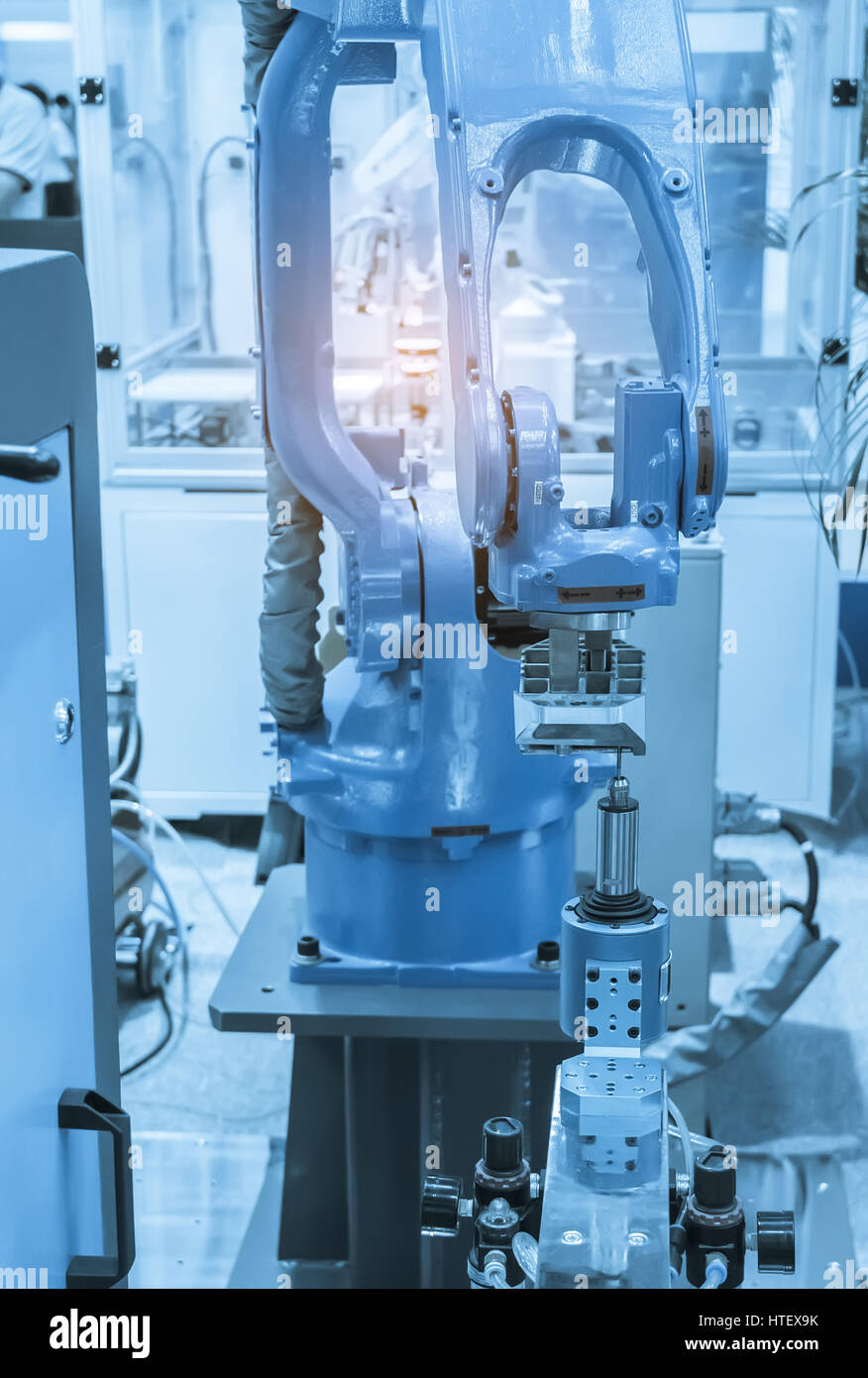 Automatic robot in assembly line working in factory. Smart factory ...