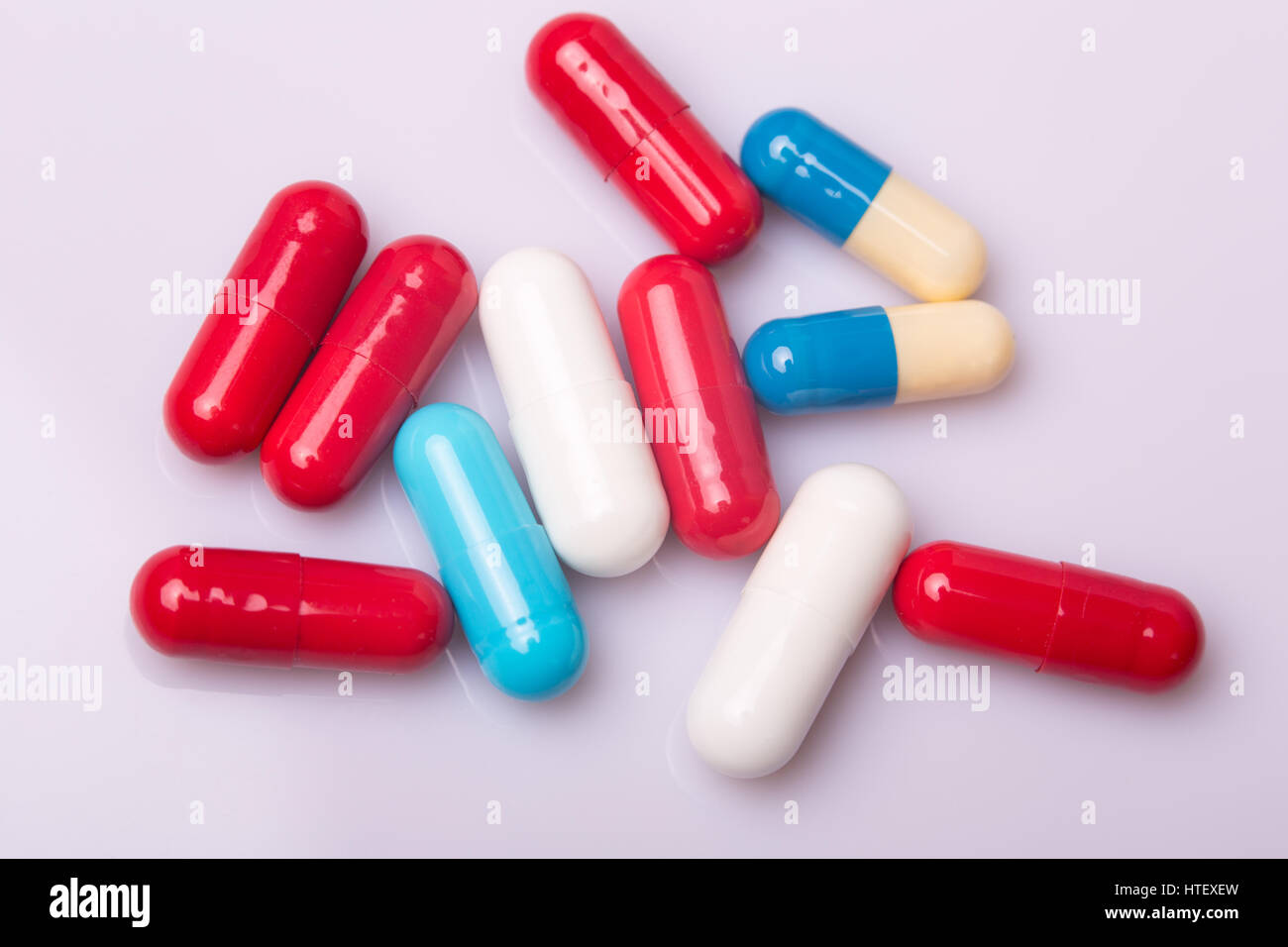 different Tablets pills capsule heap mix therapy drugs Stock Photo - Alamy
