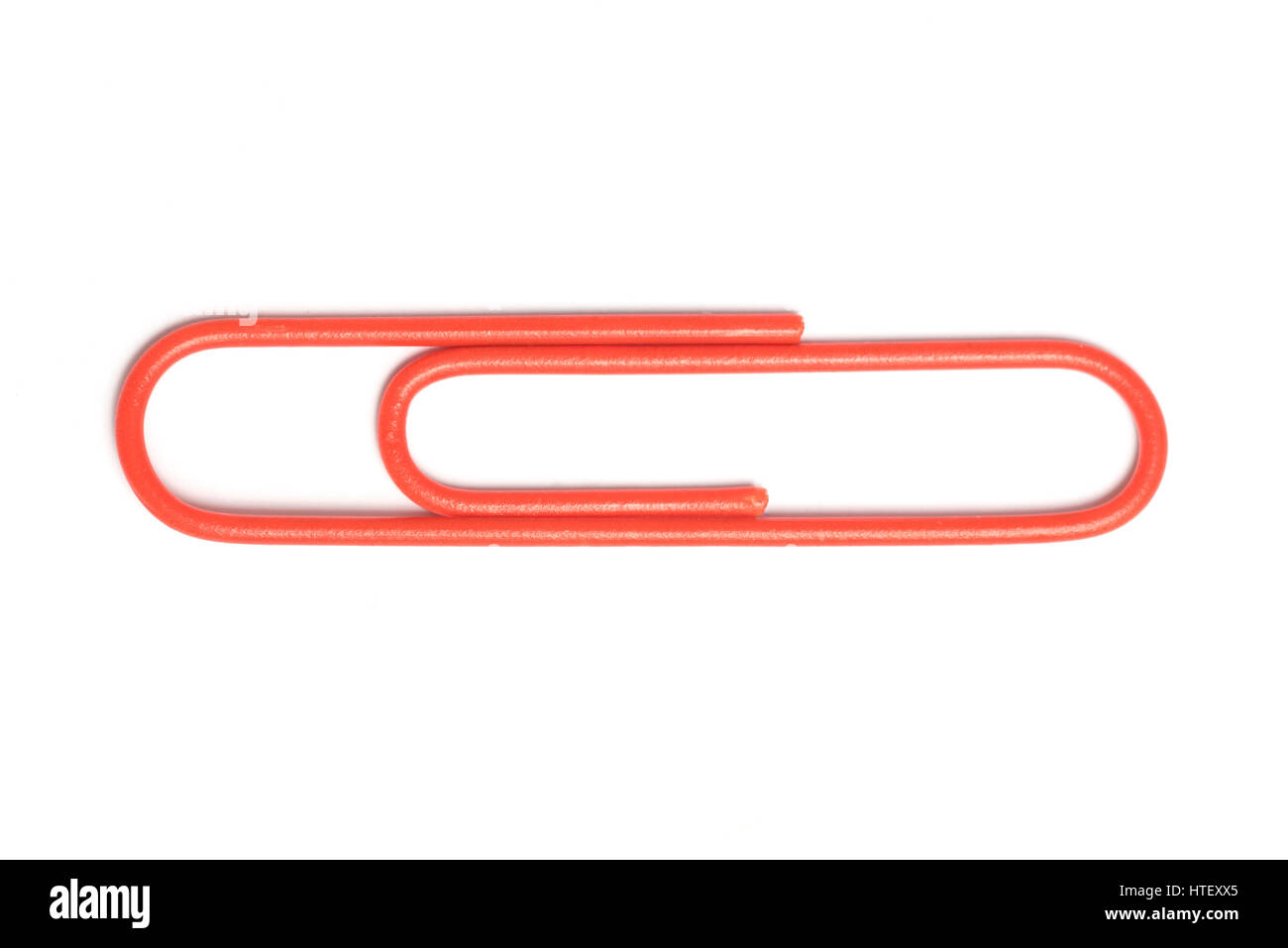 Red paper clip isolated on white background Stock Photo - Alamy