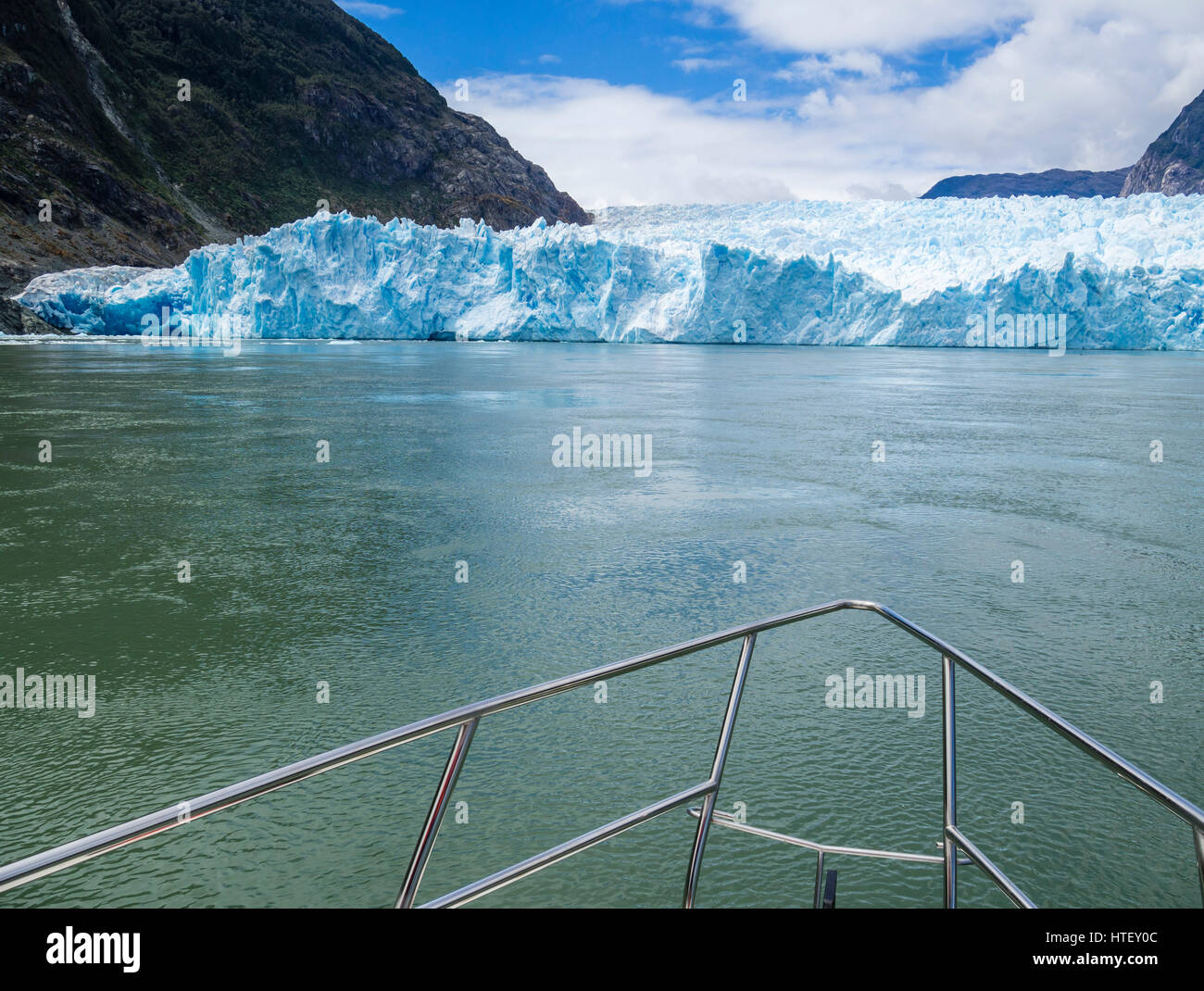 Tourists visiting the San Rafael glacier lagoon, view from excursion ...