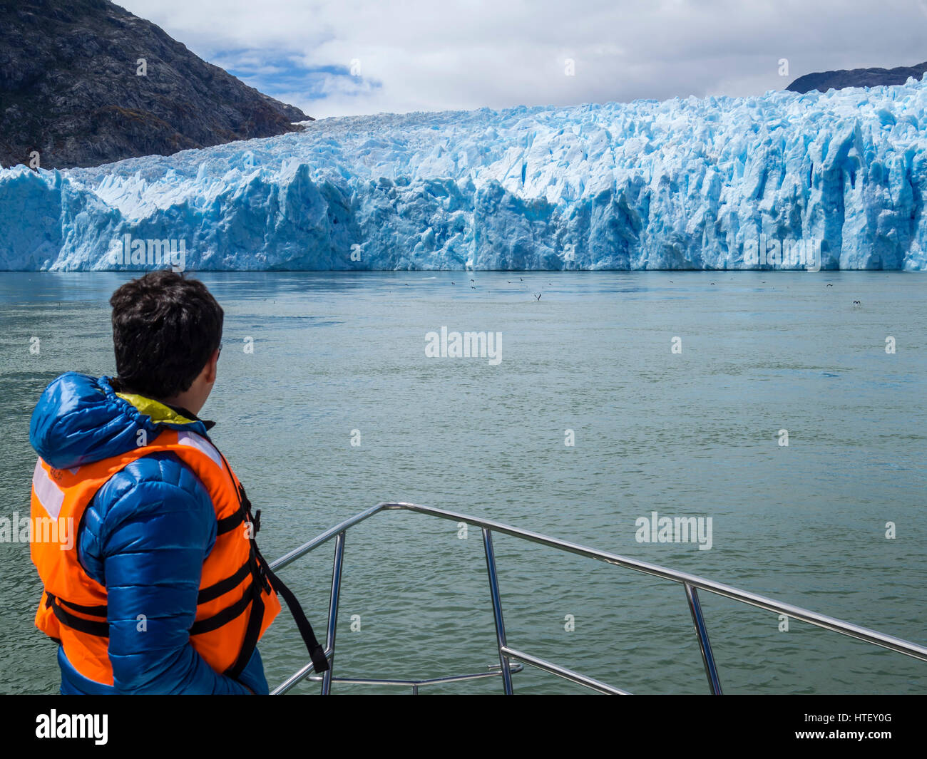Tourists visiting the San Rafael glacier lagoon, view from excursion ...
