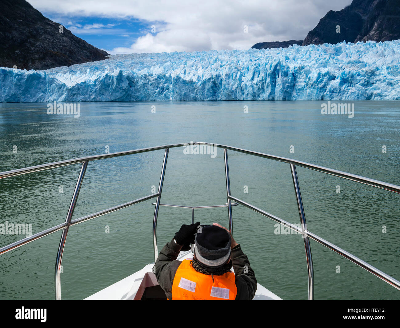 Tourists visiting the San Rafael glacier lagoon, view from excursion ...