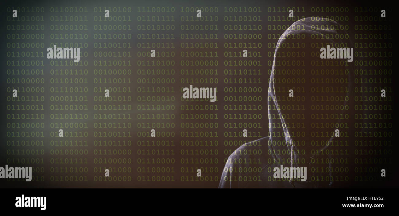 Hooded faceless man on binary code background Stock Photo - Alamy