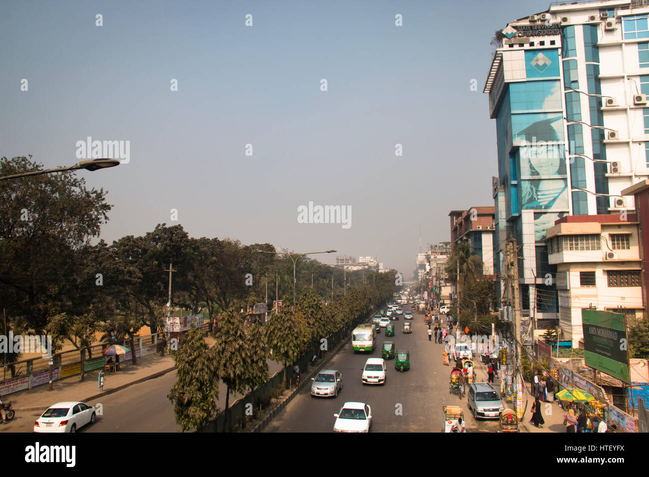 DHAKA, BANGLADESH - FEBRUARY 2017: Street with many vehicles in the ...