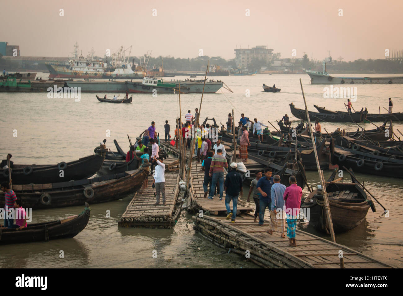 CHITTAGONG, BANGLADESH - FEBRUARY 2017: The port with many people and ...