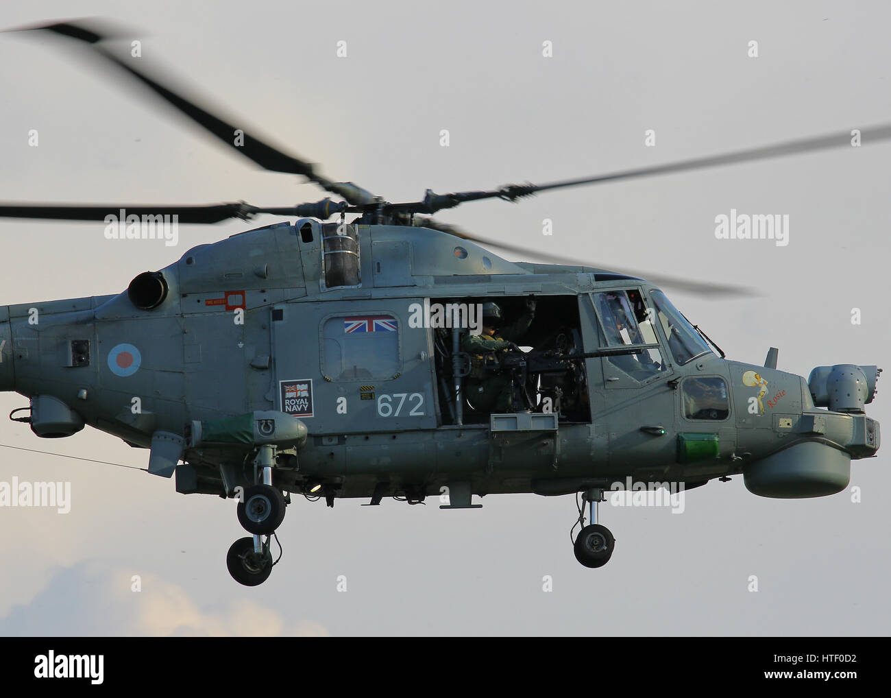 Royal Navy Lynx HMA.8 with a gun position mounted on the right side of ...