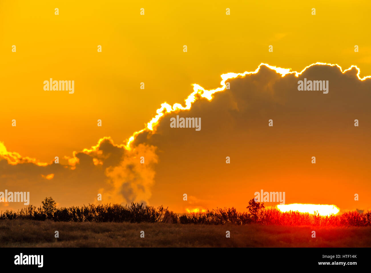 Sunrise over farm Stock Photo - Alamy