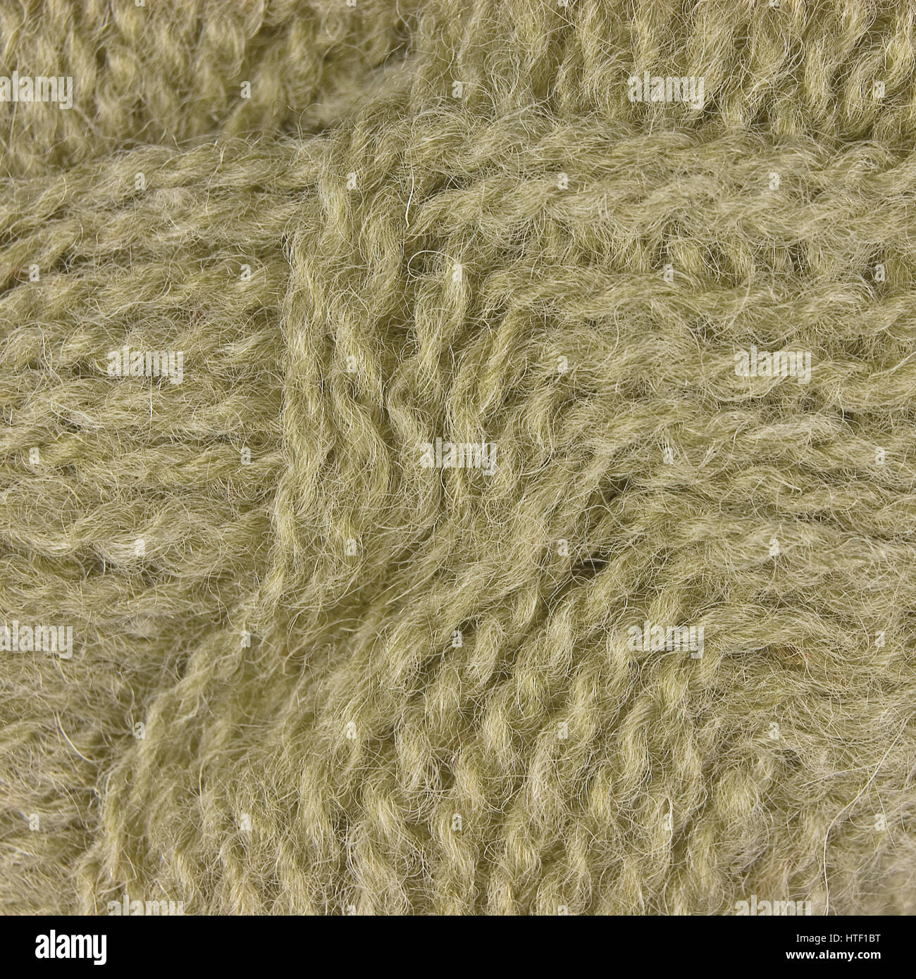 Natural beige fine wool threads texture, clew yarn macro closeup ...