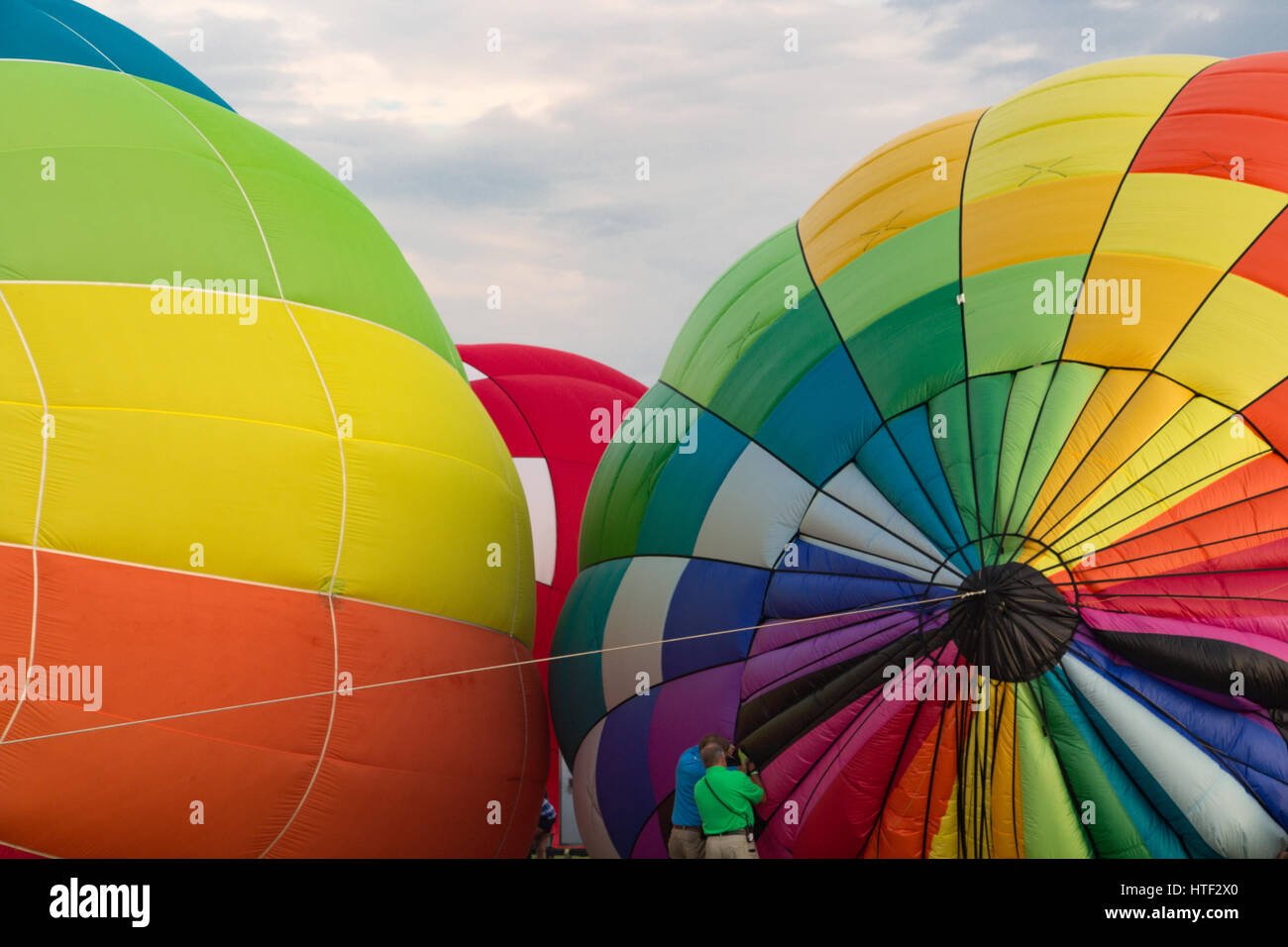 Hot Air Balloon inflating on ground Stock Photo - Alamy