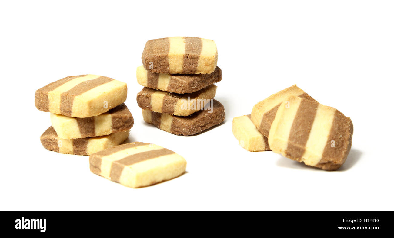A batch of eleven vanilla and chocolate shortbread cookies isolated on ...