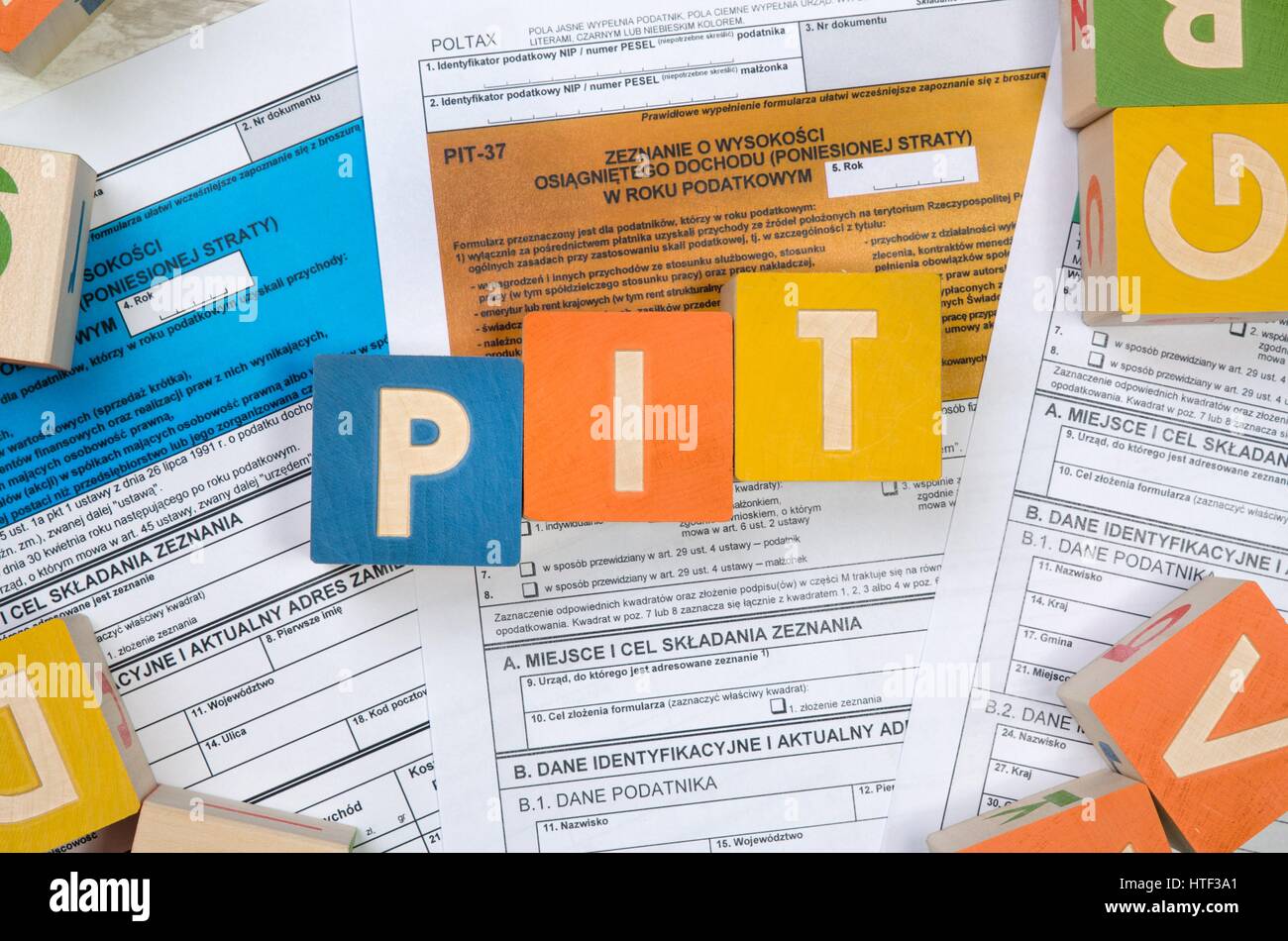 PIT word with colorful blocks. polish tax form money business finance ...
