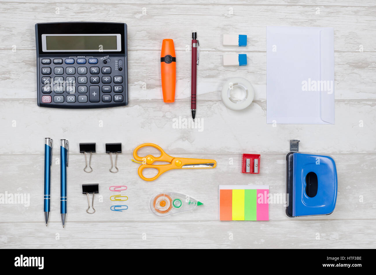 Business desk in office top view. Table with calculator, notepad, and ...