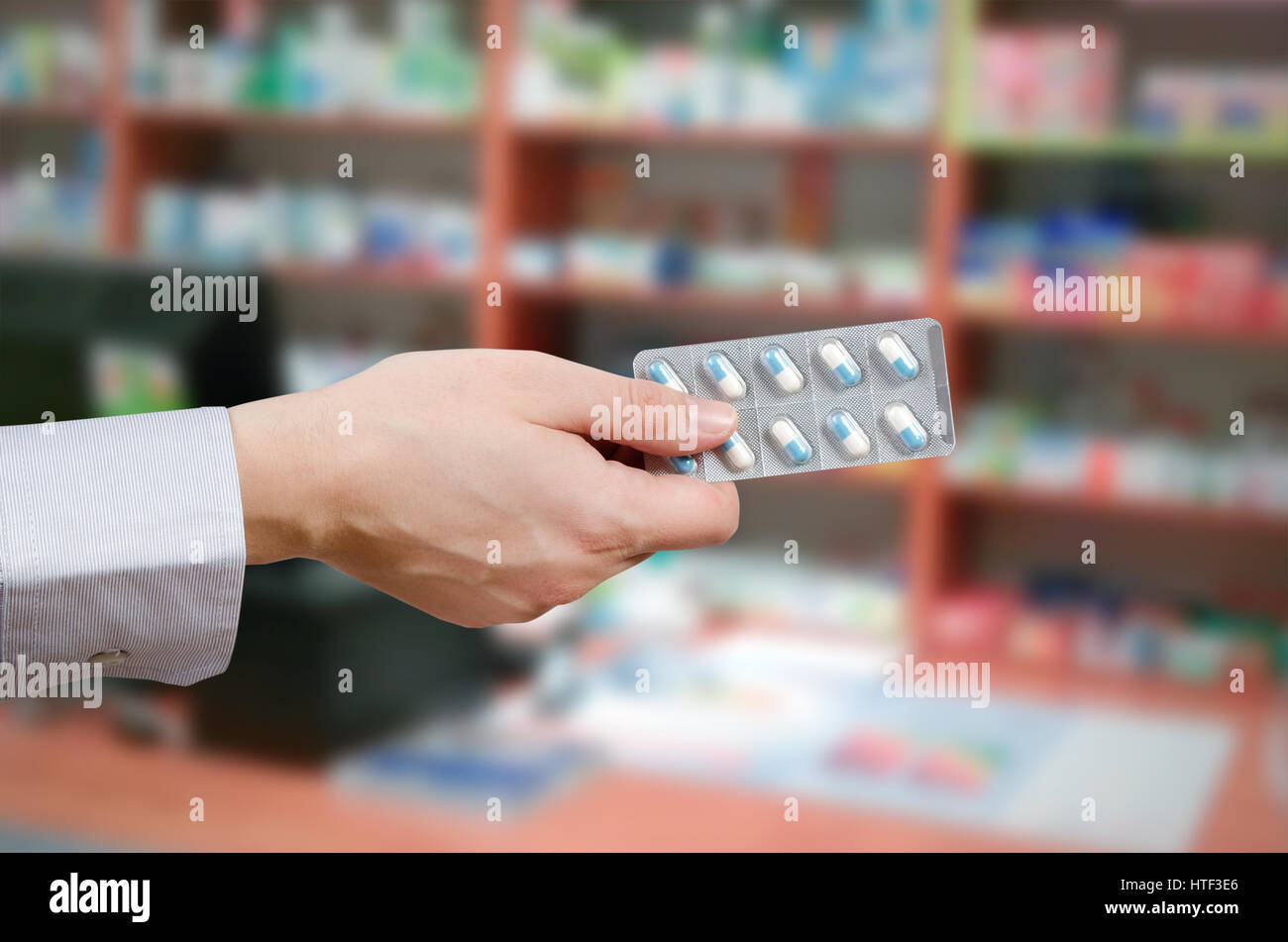 Holding tablets hi-res stock photography and images - Alamy
