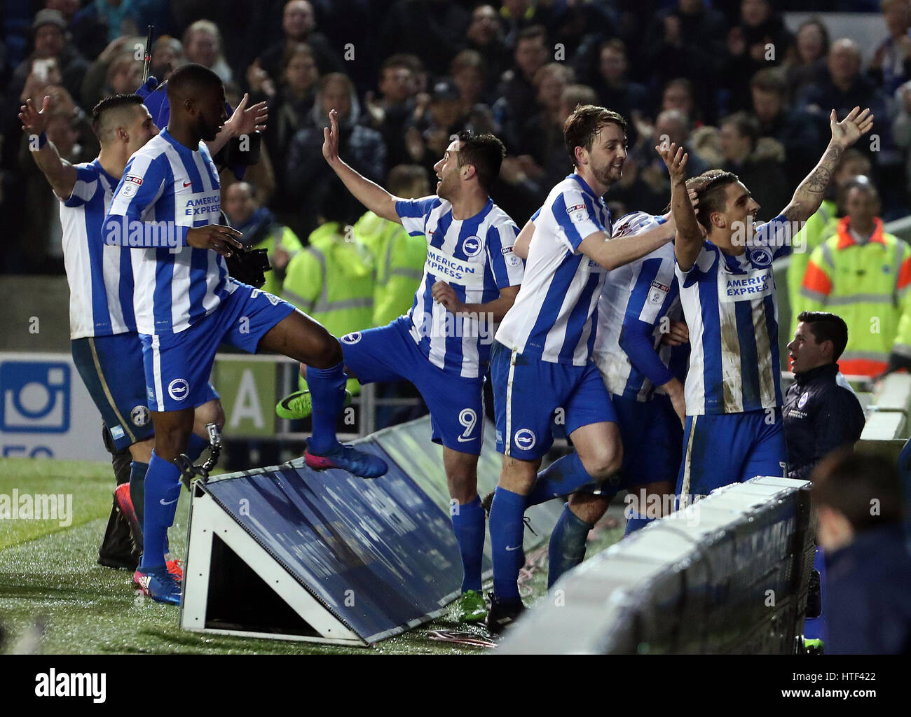 Brighton & Hove Albion players celebrate their third goal during the ...