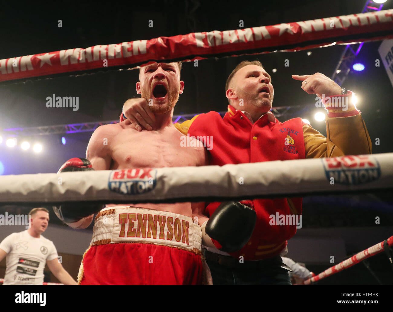 James Tennyson celebrates winning the Super-featherweight Championship ...