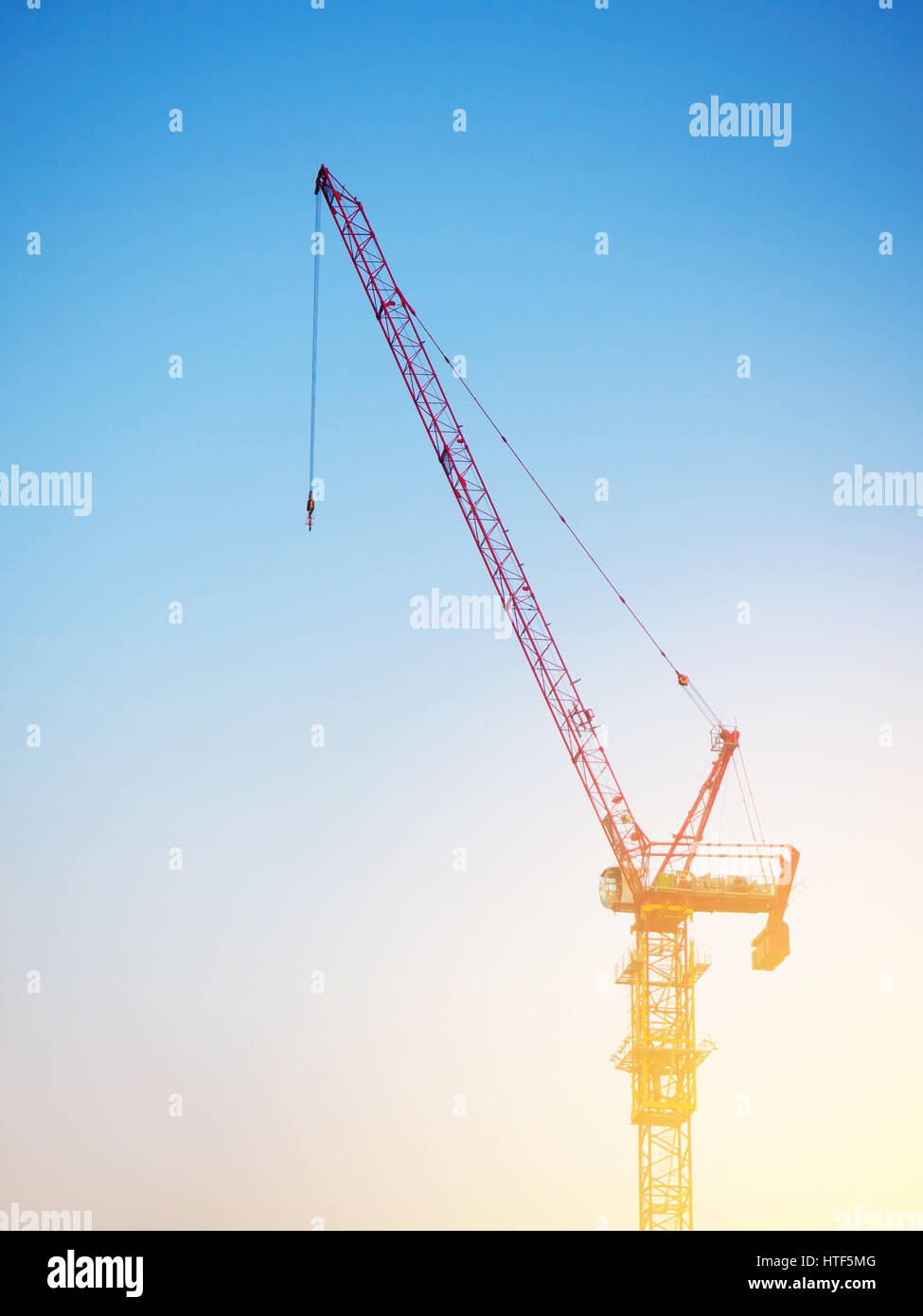 Abstract Industrial background with construction cranes silhouettes ...