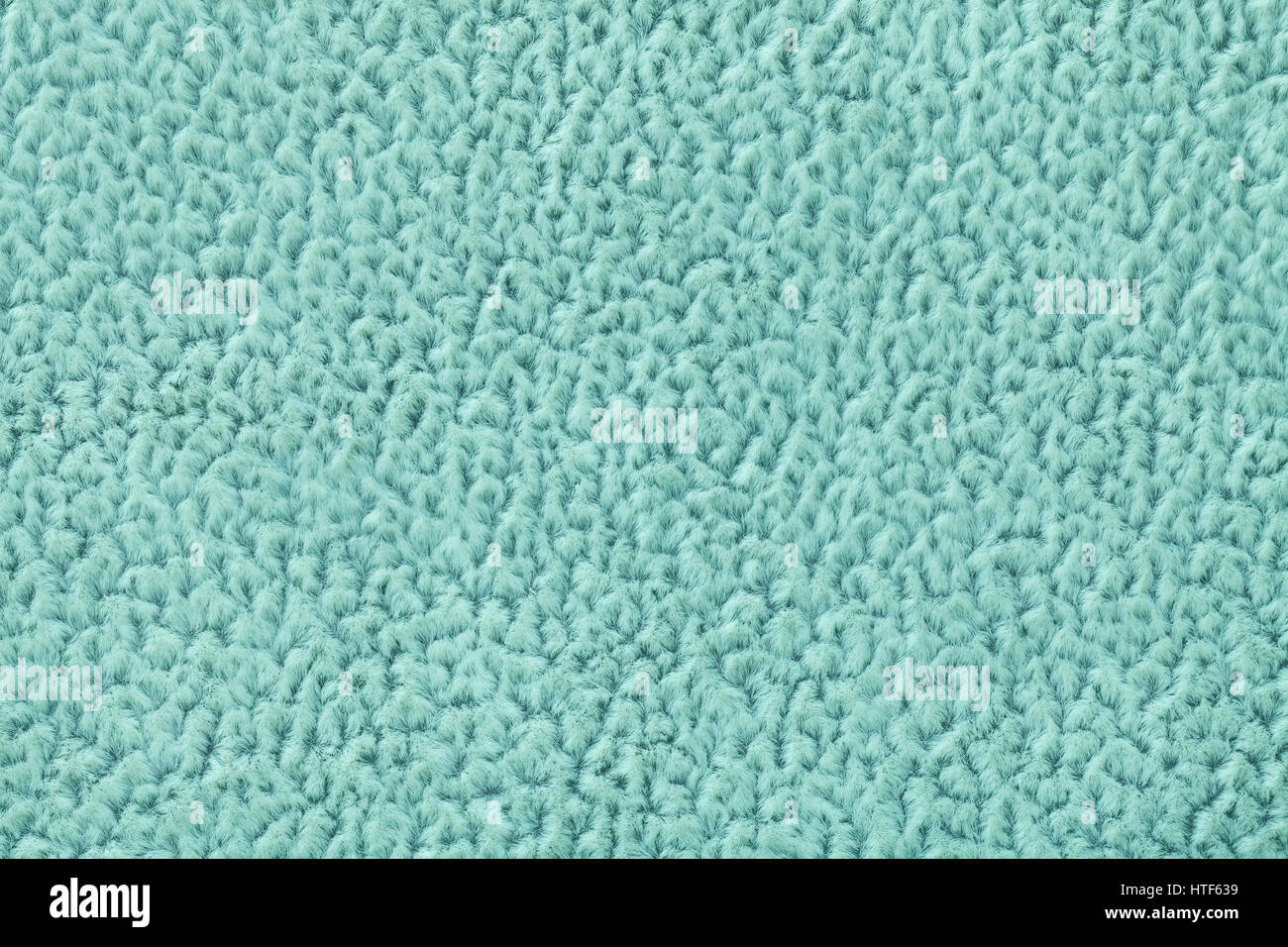 Light turquoise fluffy background of soft, fleecy cloth. Texture of ...