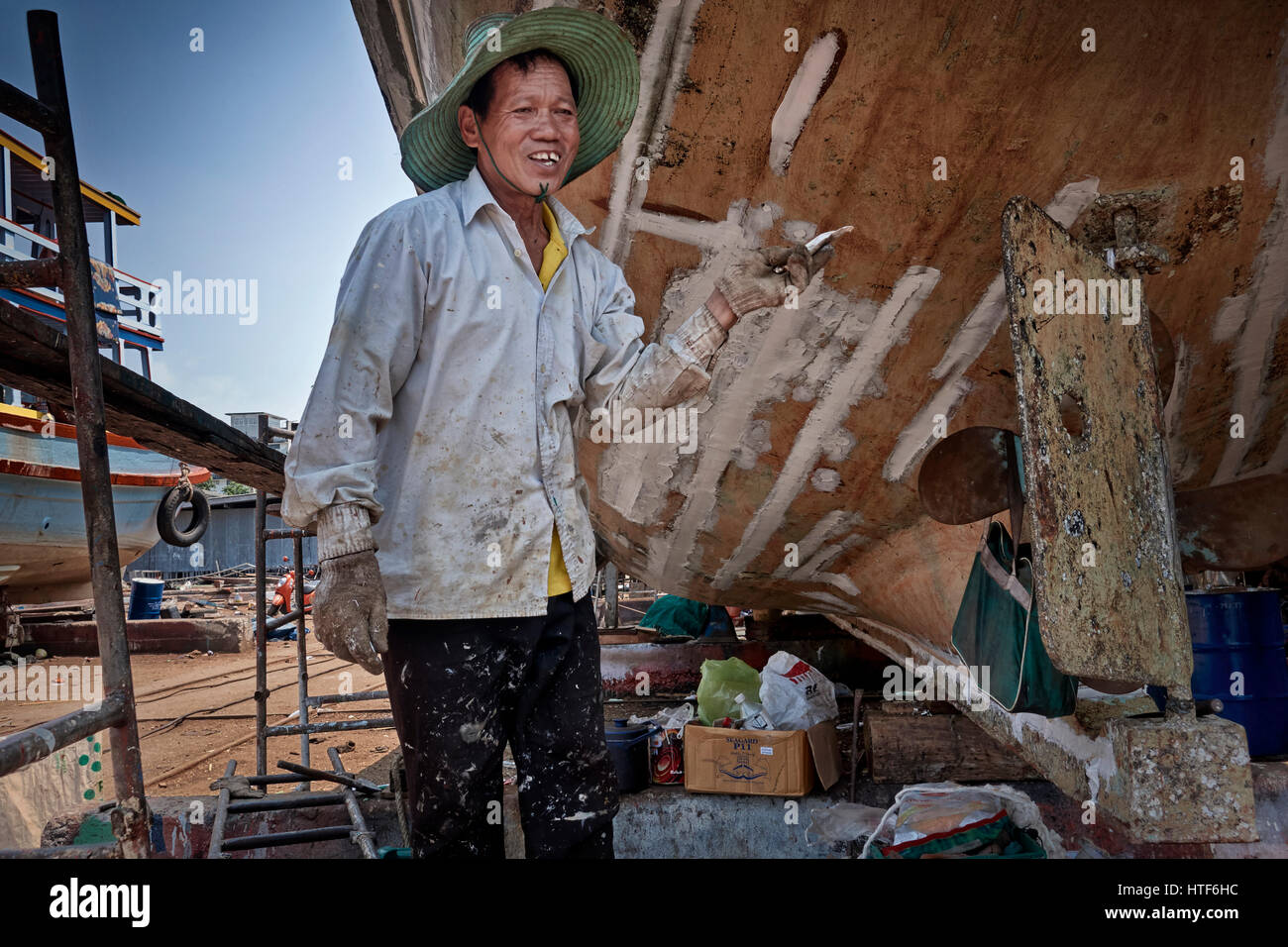 Boat yard Thailand, People working at a commercial fishing boat repair ...