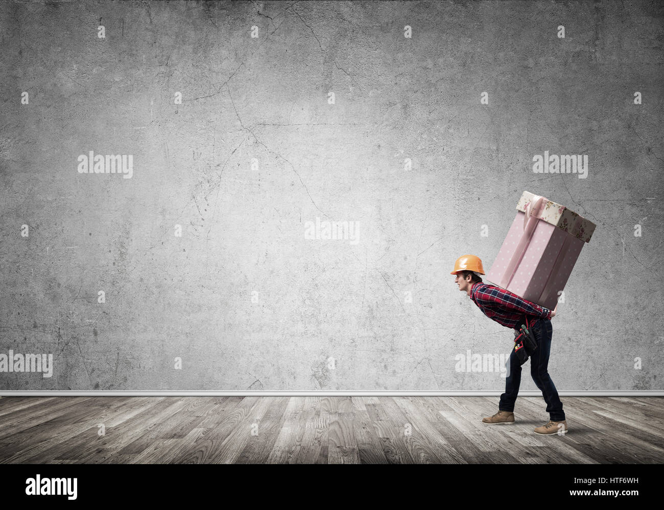 Man with heavy pack on his back hi-res stock photography and images - Alamy