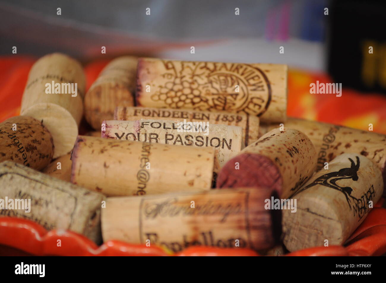 Wine corks in ceramic bowl Stock Photo - Alamy