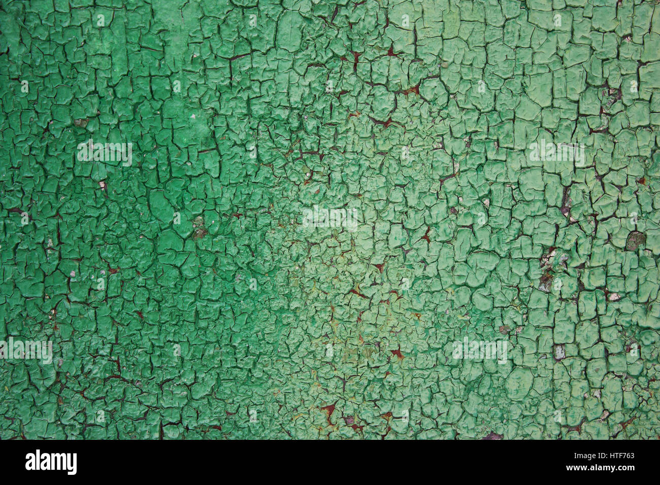 Green rusty background, rough, rough texture in the cracks. Corrosion ...