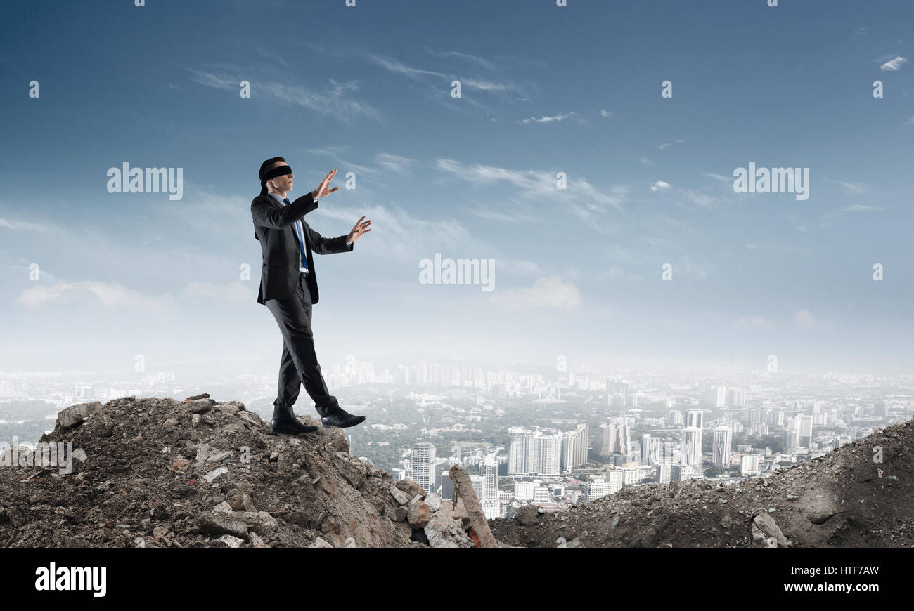 Concept of risk and danger in business with man steping blind Stock ...