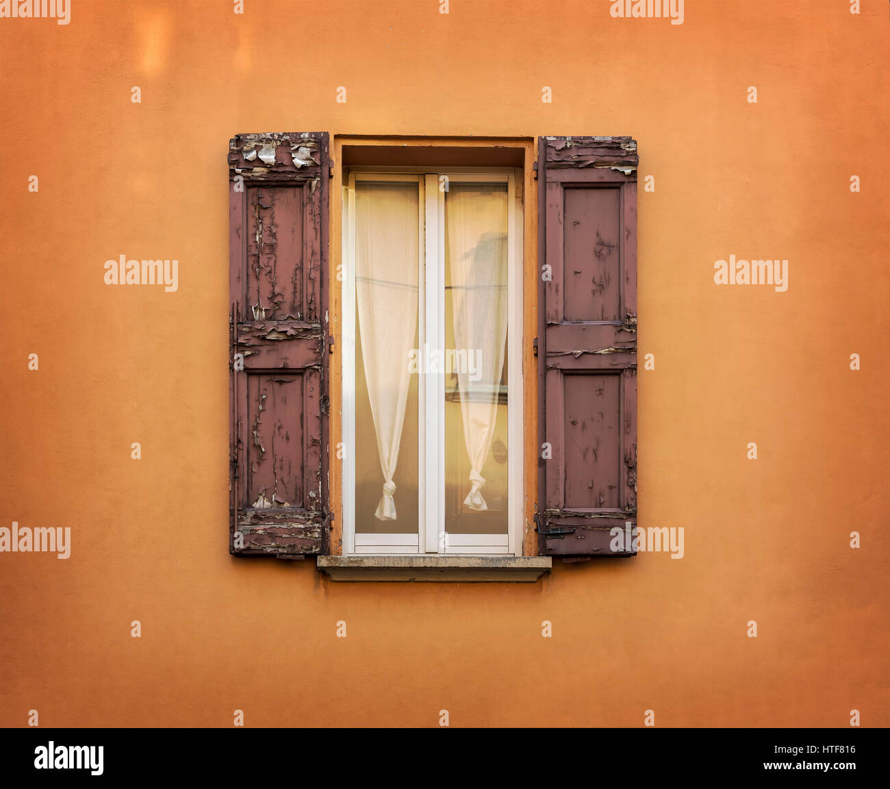 Traditional window with wooden shutters. Bologna, Italy Stock Photo - Alamy