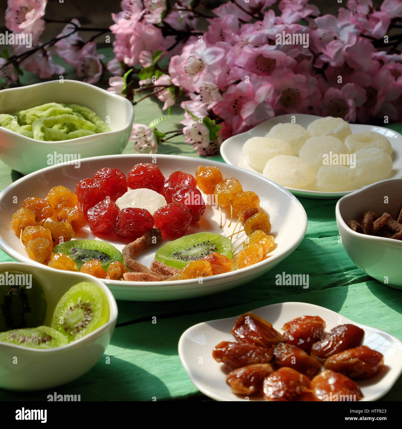 colorful Vietnamese jam for Vietnam Tet holiday on green background ...