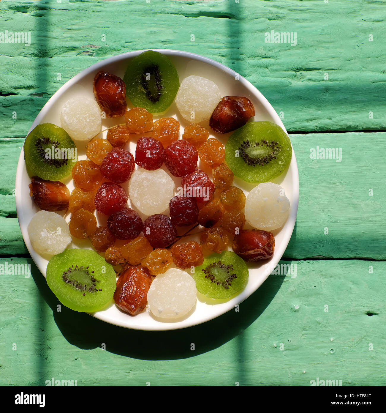 colorful Vietnamese jam for Vietnam Tet holiday on green background ...