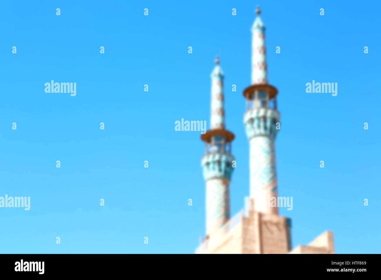 in iran blur islamic mausoleum old architecture mosque minaret near the sky Stock Photo - Alamy