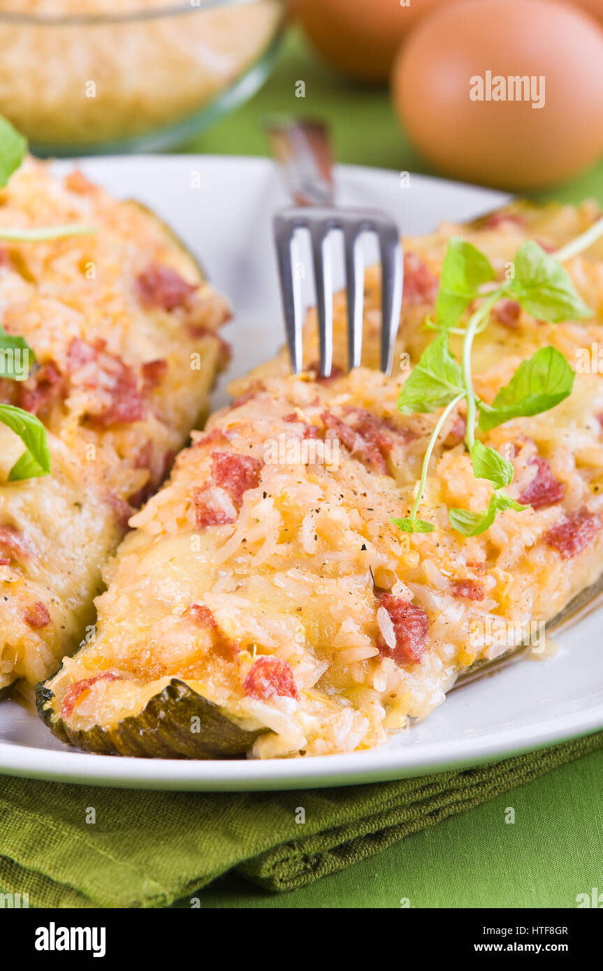 Stuffed zucchini halves Stock Photo - Alamy