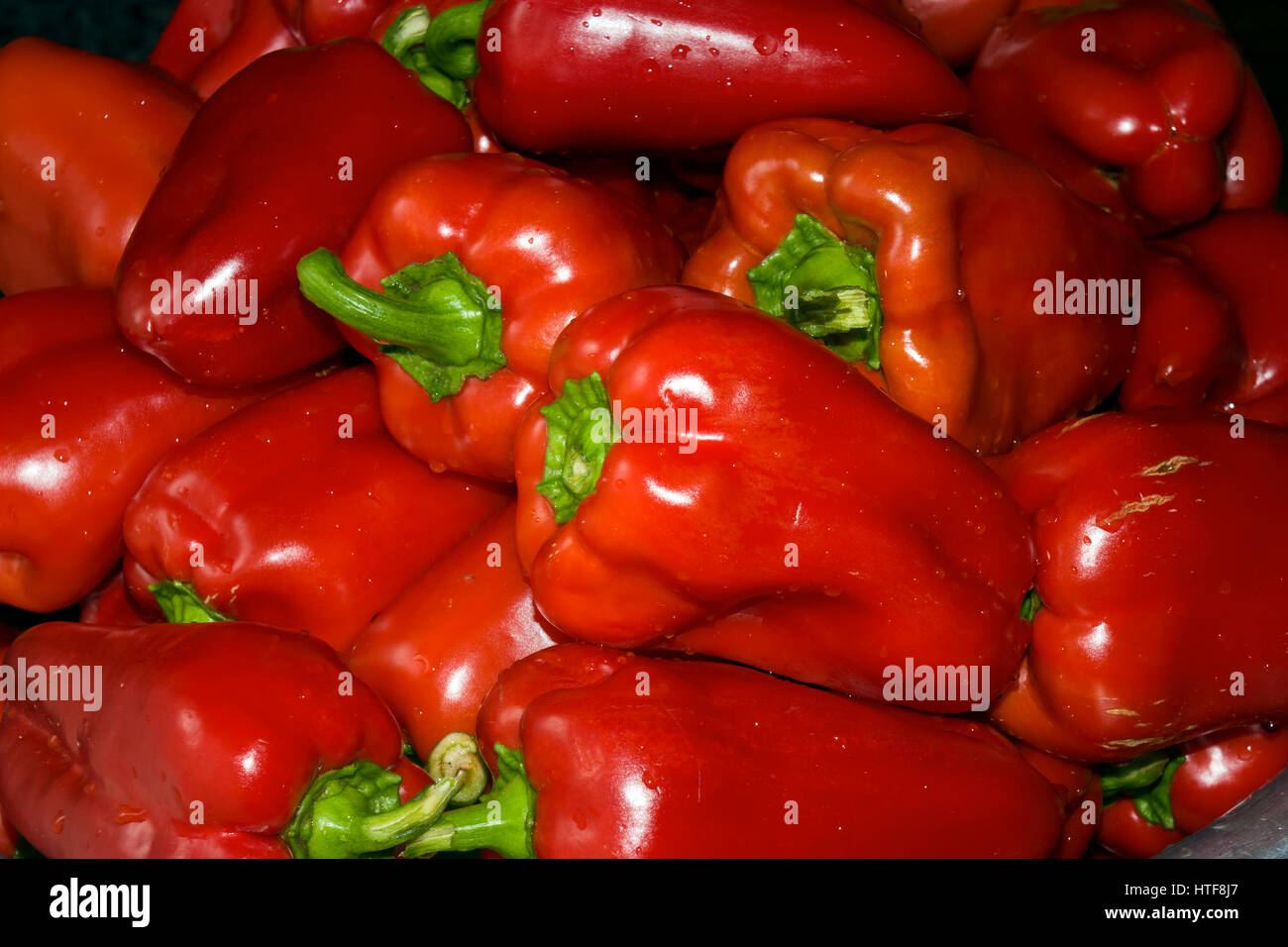 An assortment of fresh red bell peppers Stock Photo - Alamy