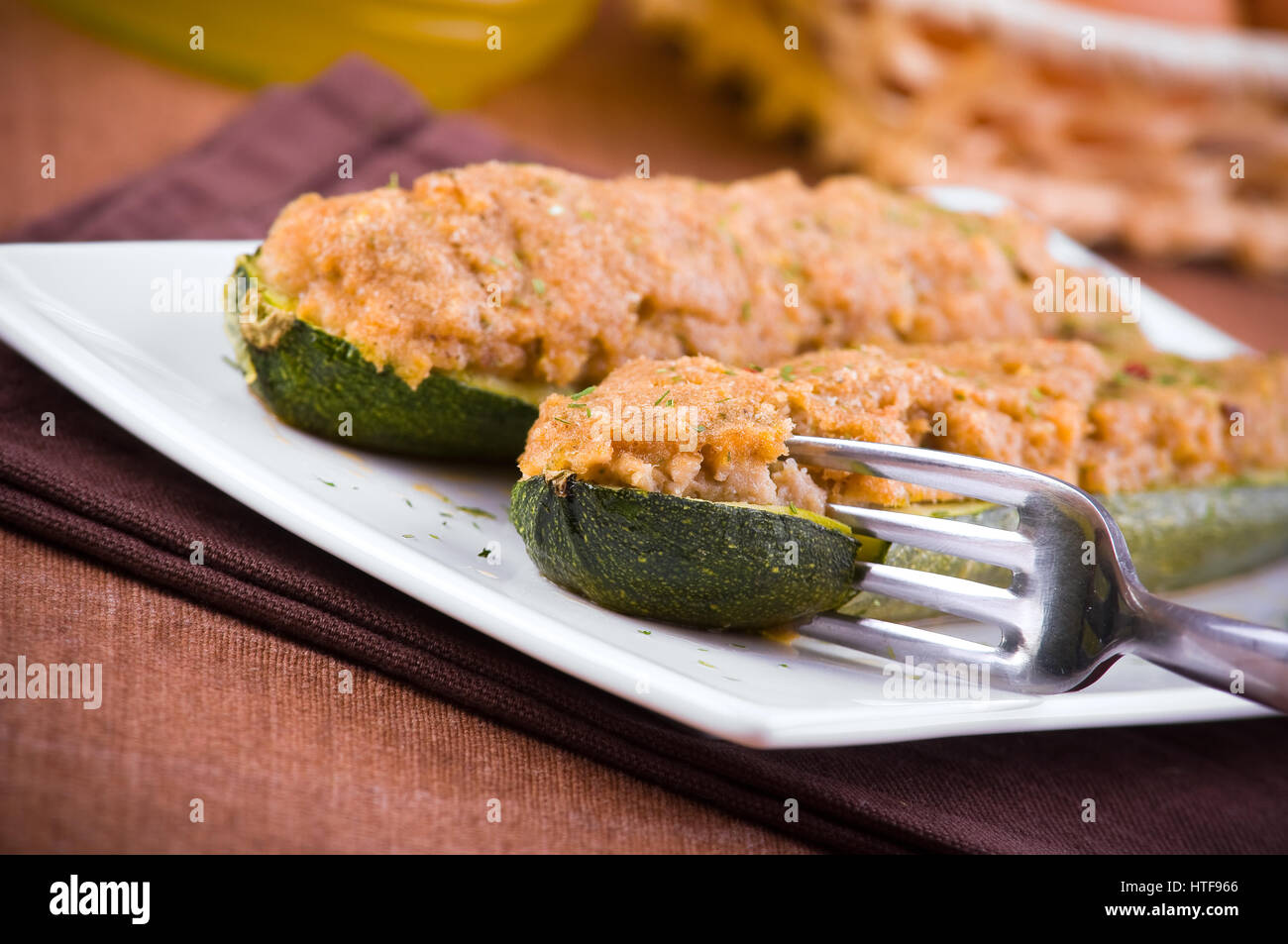 Stuffed zucchini halves Stock Photo - Alamy