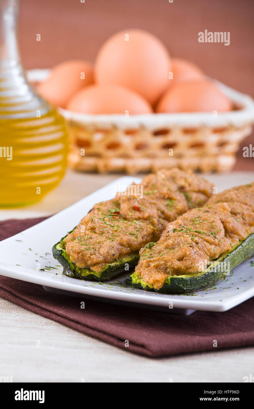 Stuffed zucchini halves Stock Photo - Alamy
