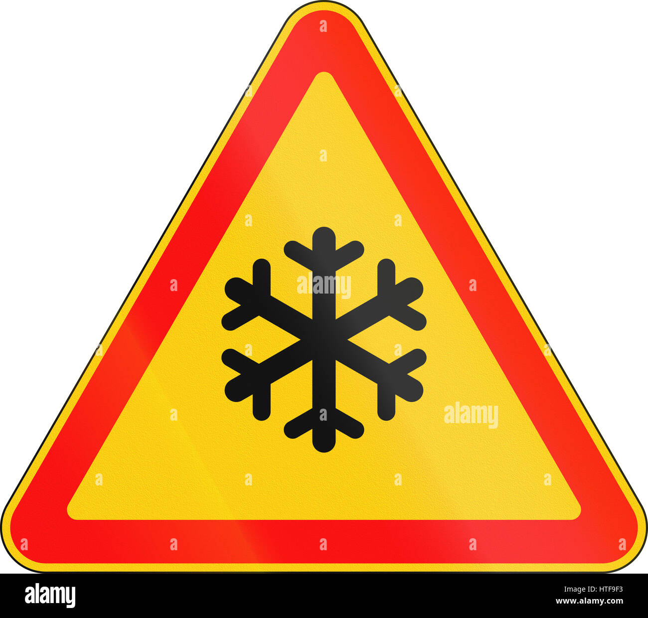 Belarusian road warning sign - Snow or frost Stock Photo - Alamy