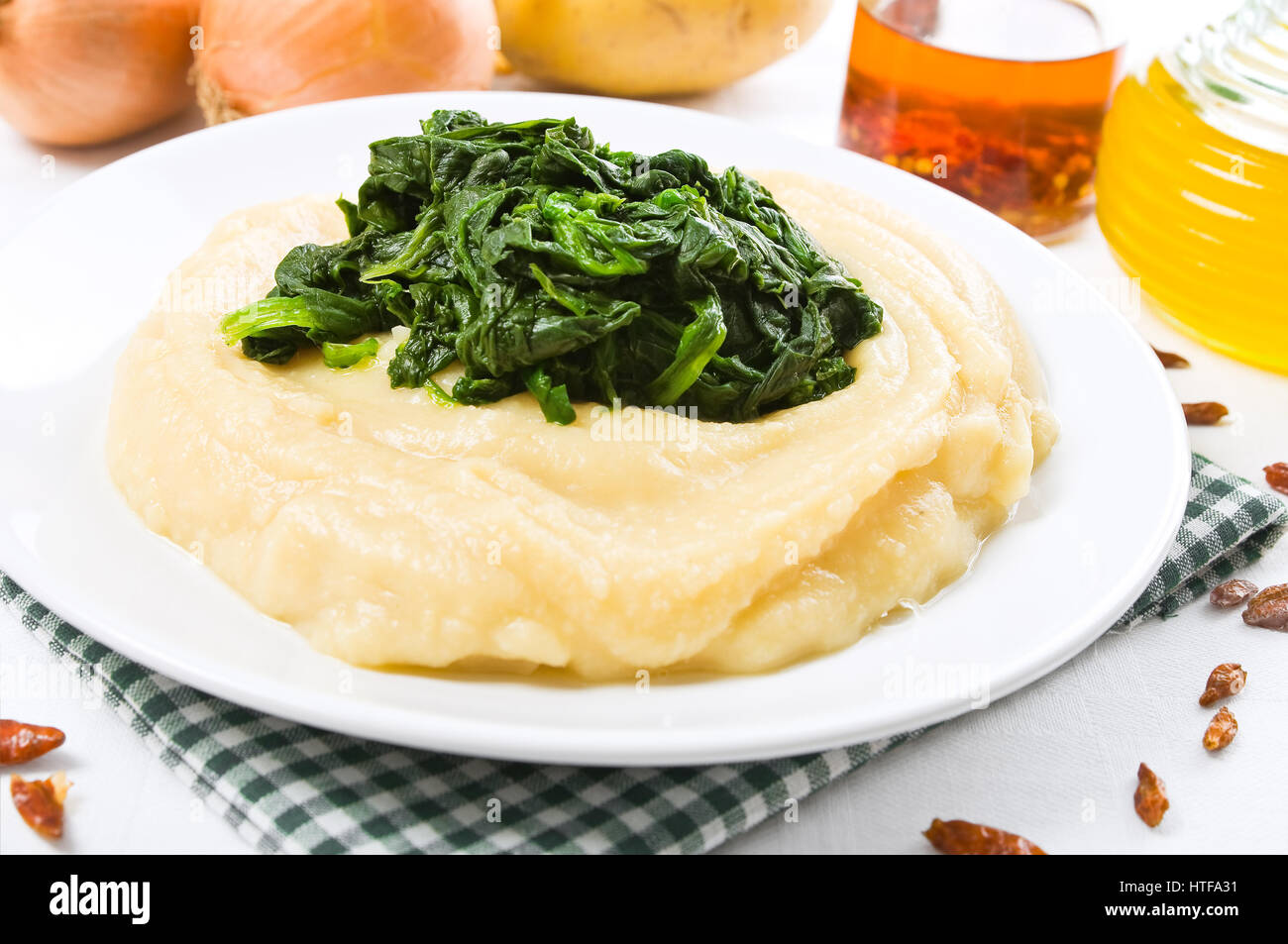 Fava bean puree with spinach Stock Photo - Alamy